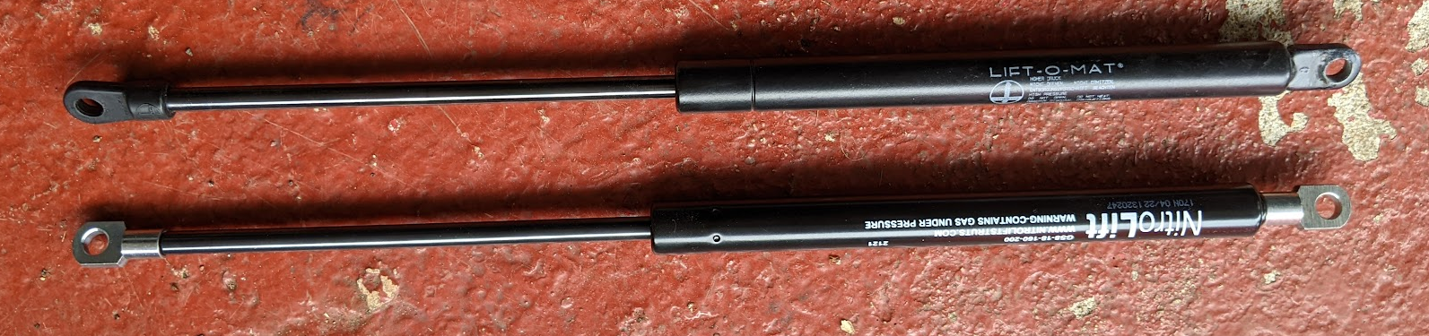 Boot gas strut replacement